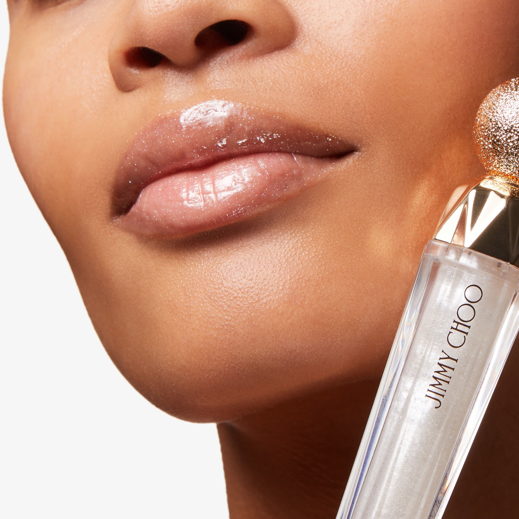 Pure Glow Clear Glitter Plumping Lip Gloss | Beauty Collection | JIMMY CHOO
