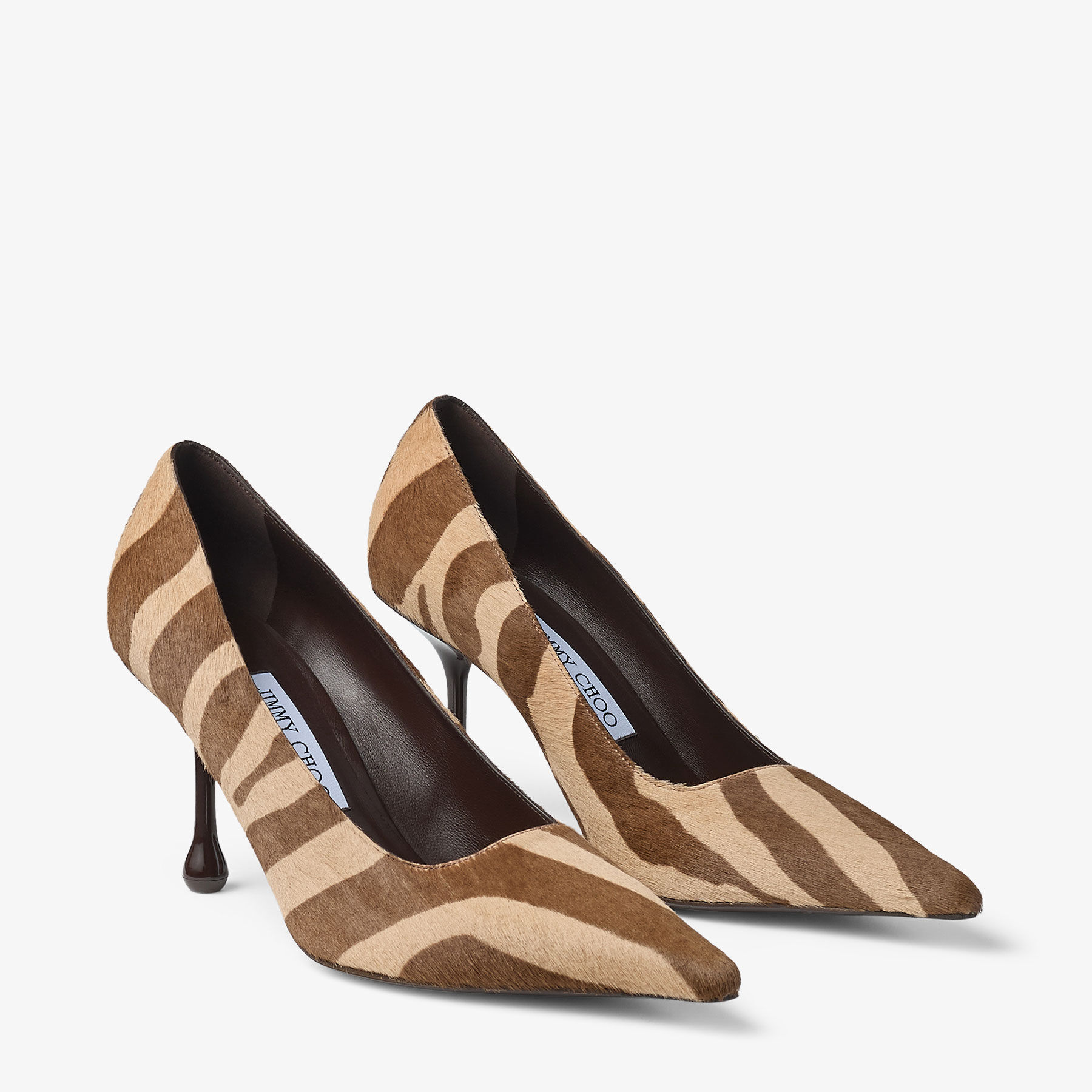 Ixia 80 | Chocolate Zebra Printed Pony Pumps | JIMMY CHOO