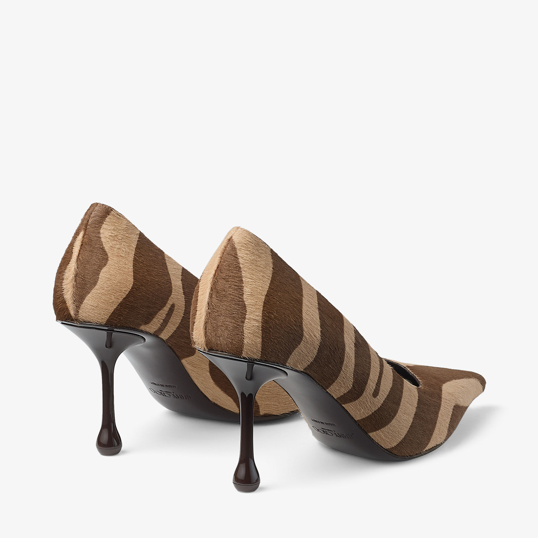 Ixia 80 | Chocolate Zebra Printed Pony Pumps | JIMMY CHOO