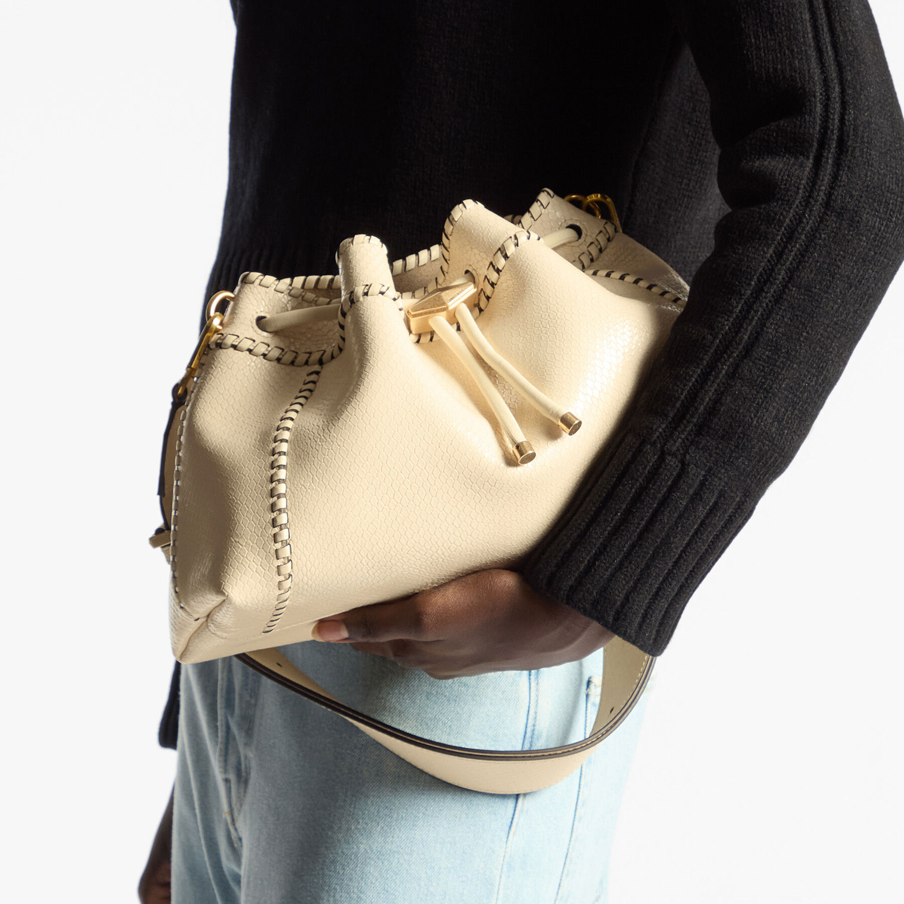 Cinch M | Buttermilk Elaphe Printed Leather Bucket Bag with Biker Leather Topstitching | JIMMY CHOO