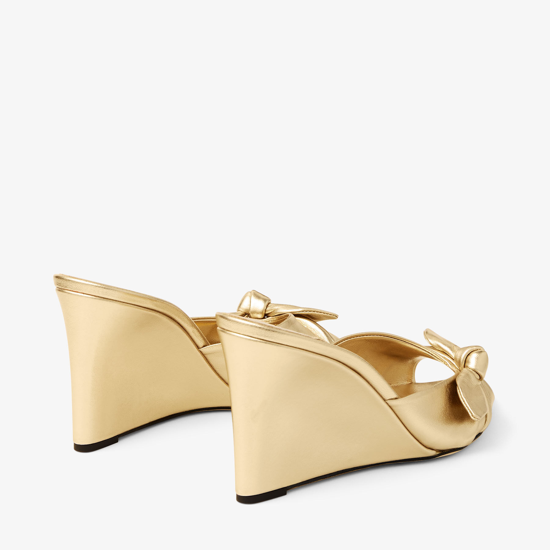 Livi Wedge 85 | Mules à talon compensé en cuir nappa métallisé doré ...